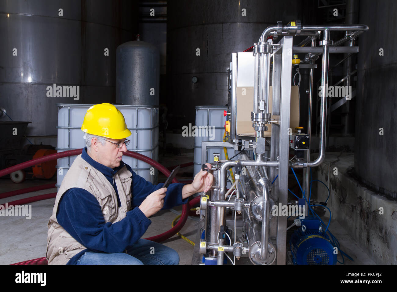 repairman at maintenance work Stock Photo - Alamy