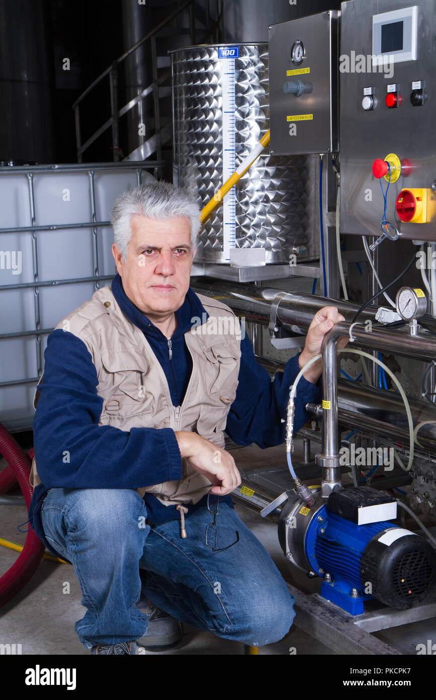 repairman at maintenance work Stock Photo - Alamy