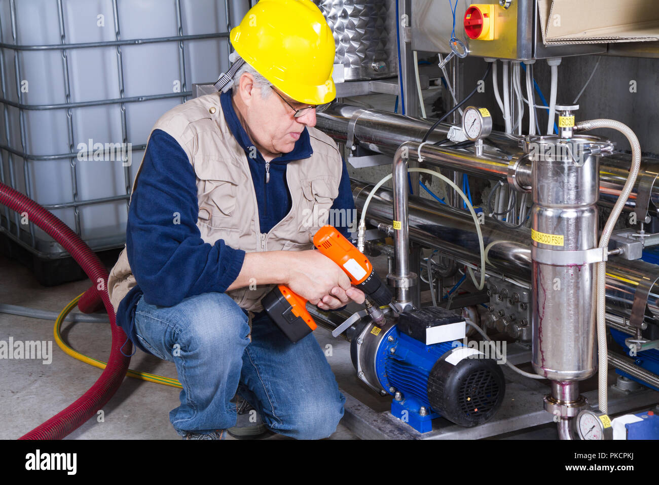 repairman at maintenance work Stock Photo - Alamy