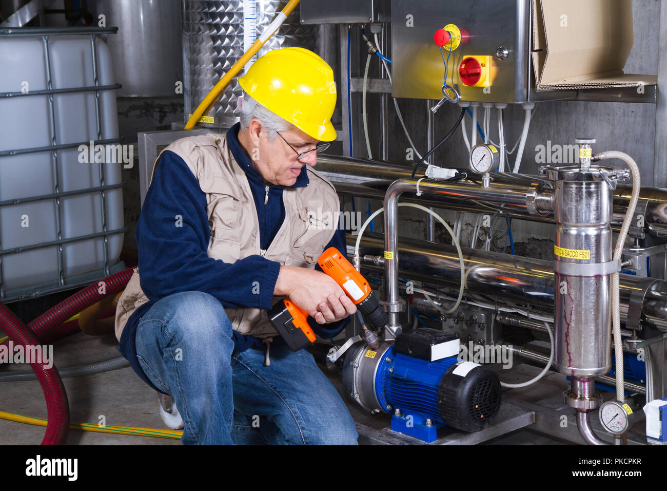 repairman at maintenance work Stock Photo - Alamy