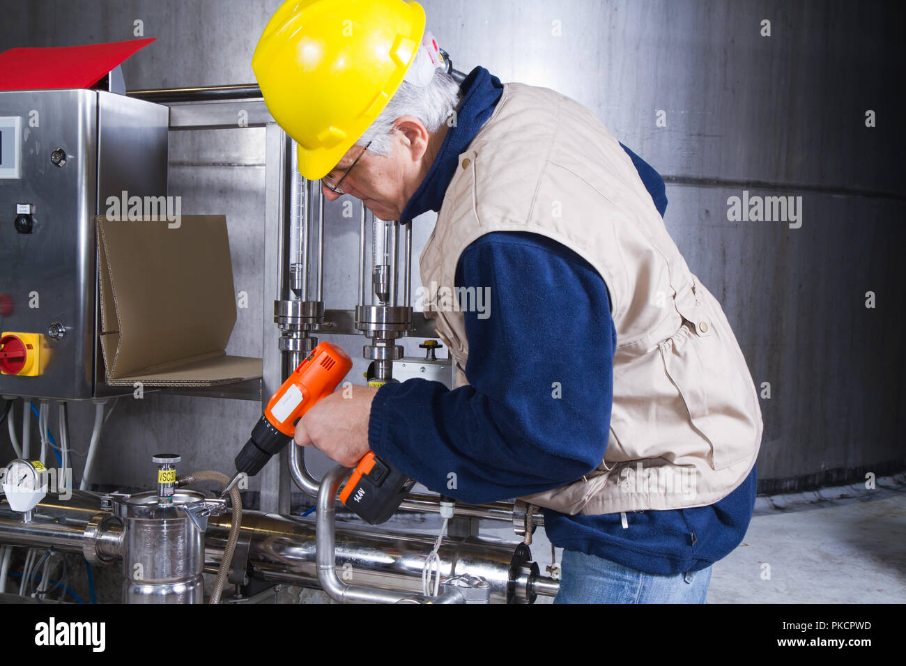 repairman at maintenance work Stock Photo - Alamy