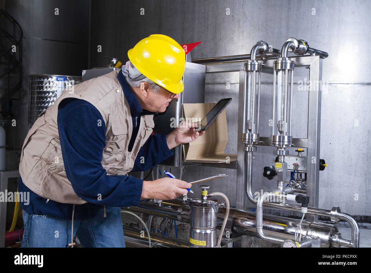 repairman at maintenance work Stock Photo - Alamy