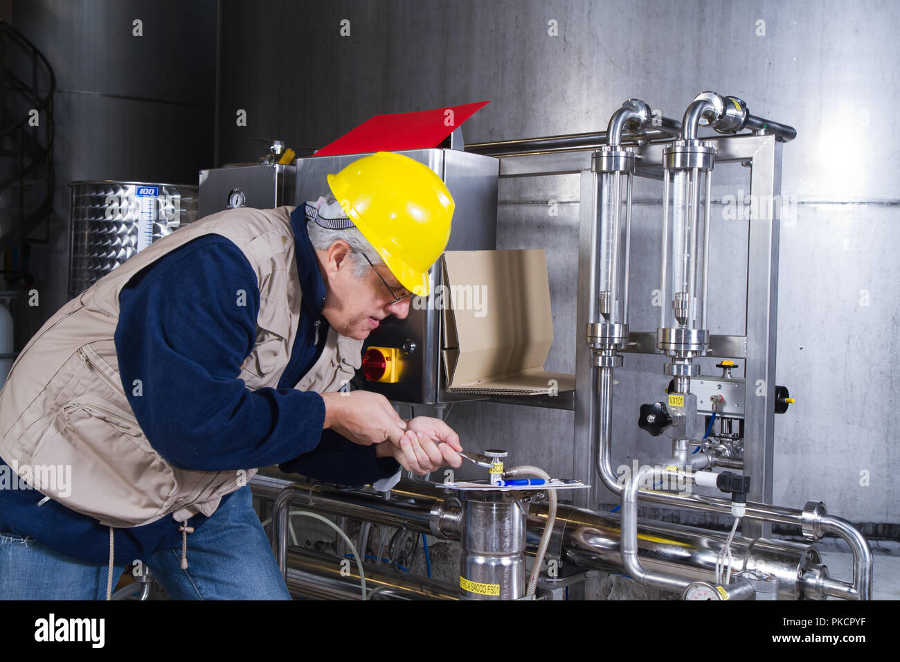 repairman at maintenance work Stock Photo - Alamy