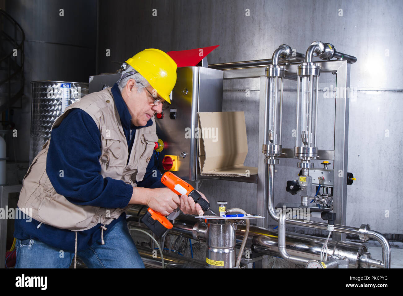 repairman at maintenance work Stock Photo - Alamy