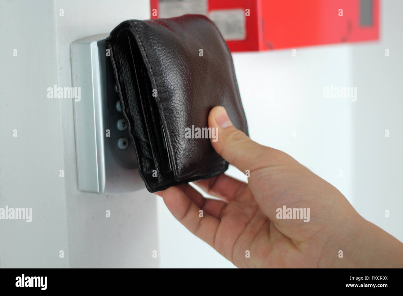 Hand bag of money with the card magnetic signs to kick the receiver to ...