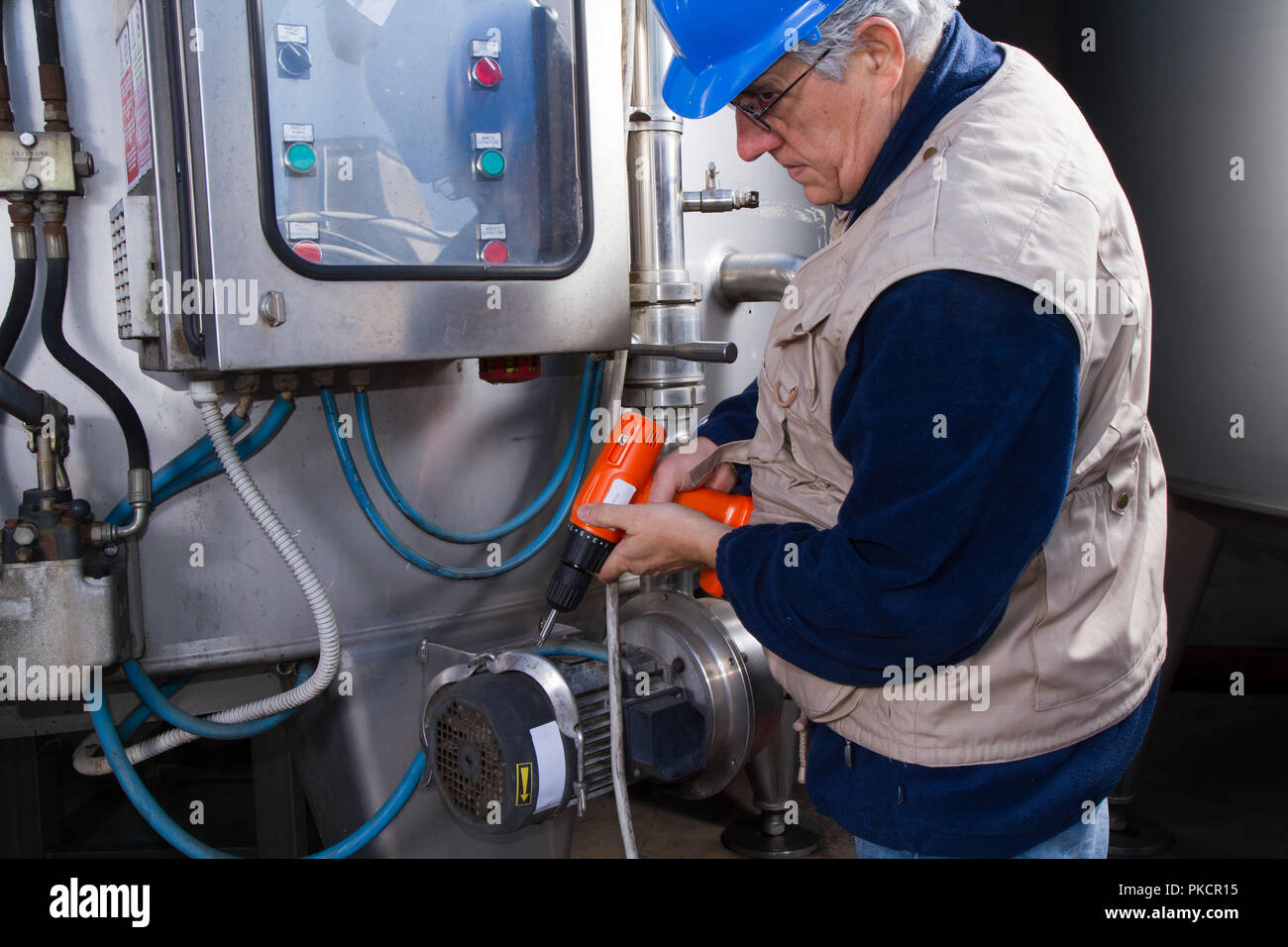 repairman during maintenance work Stock Photo - Alamy