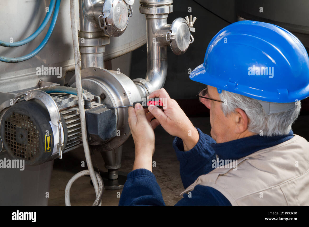 repairman during maintenance work Stock Photo - Alamy