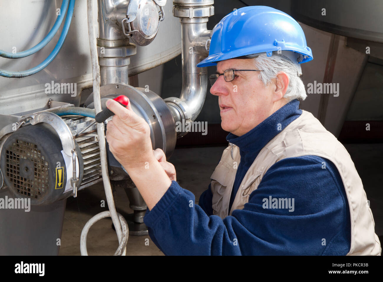 repairman during maintenance work Stock Photo - Alamy
