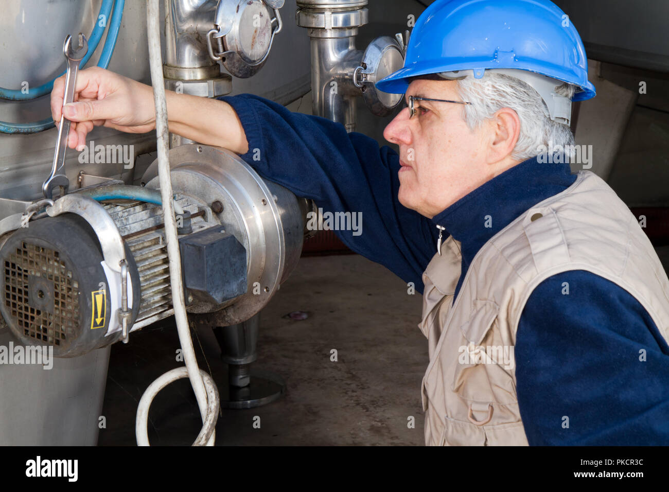 repairman during maintenance work Stock Photo - Alamy
