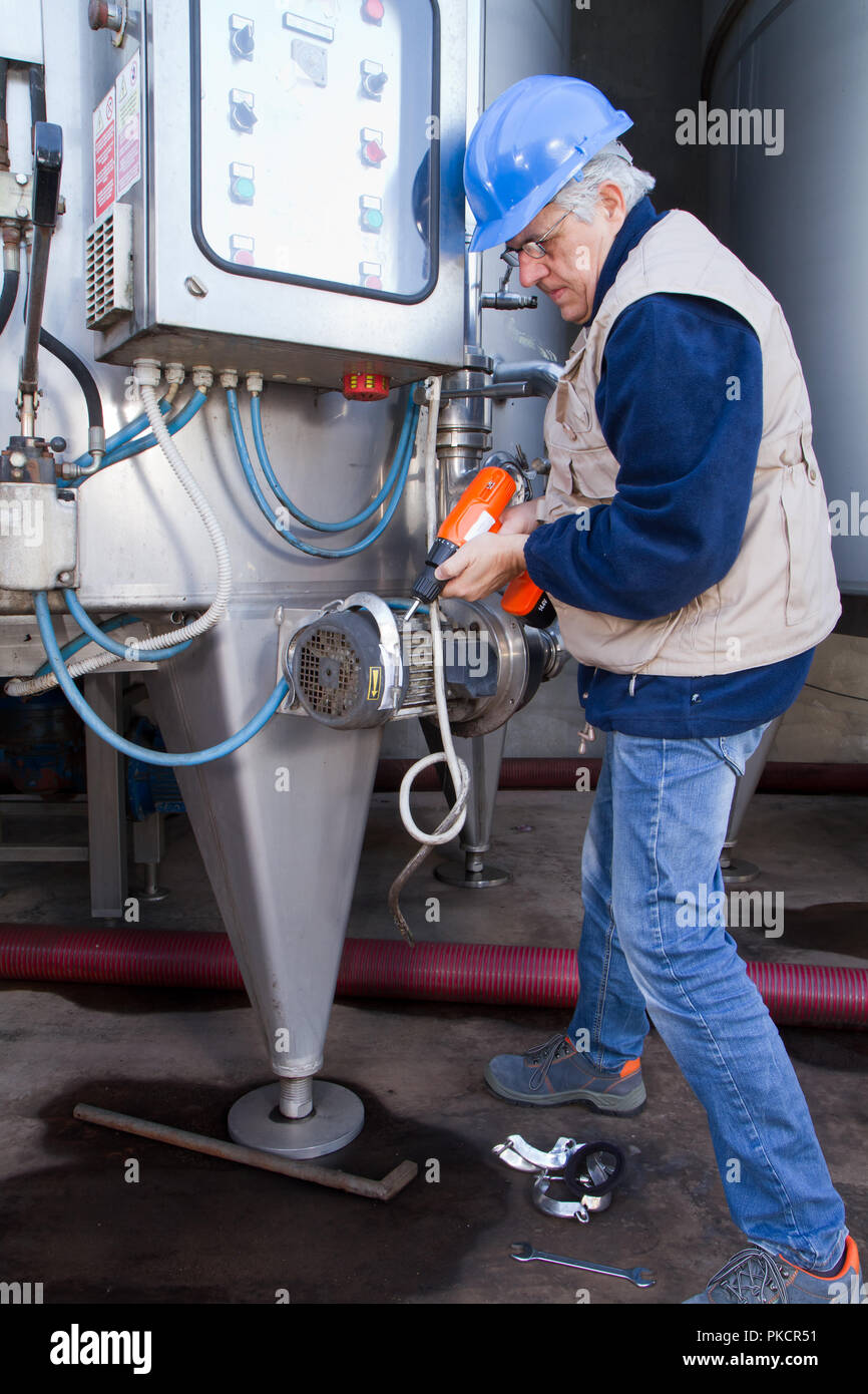 repairman during maintenance work Stock Photo - Alamy