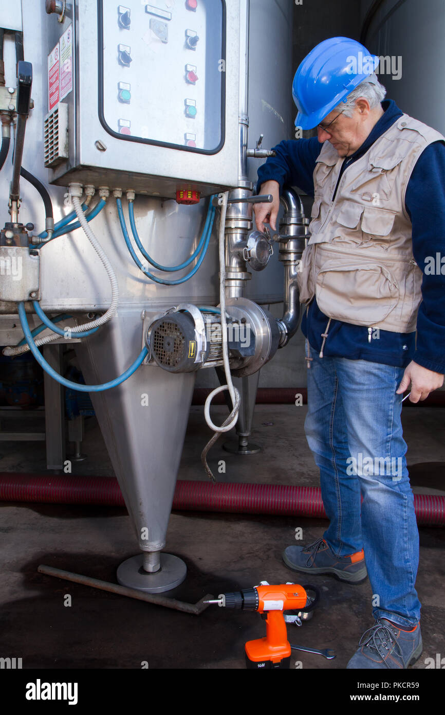 repairman during maintenance work Stock Photo - Alamy