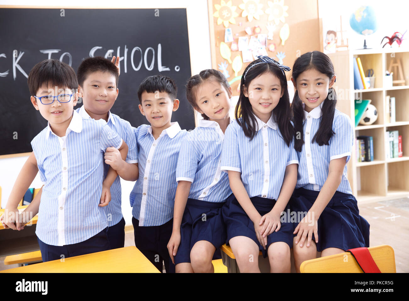 Lovely students in the classroom Stock Photo - Alamy