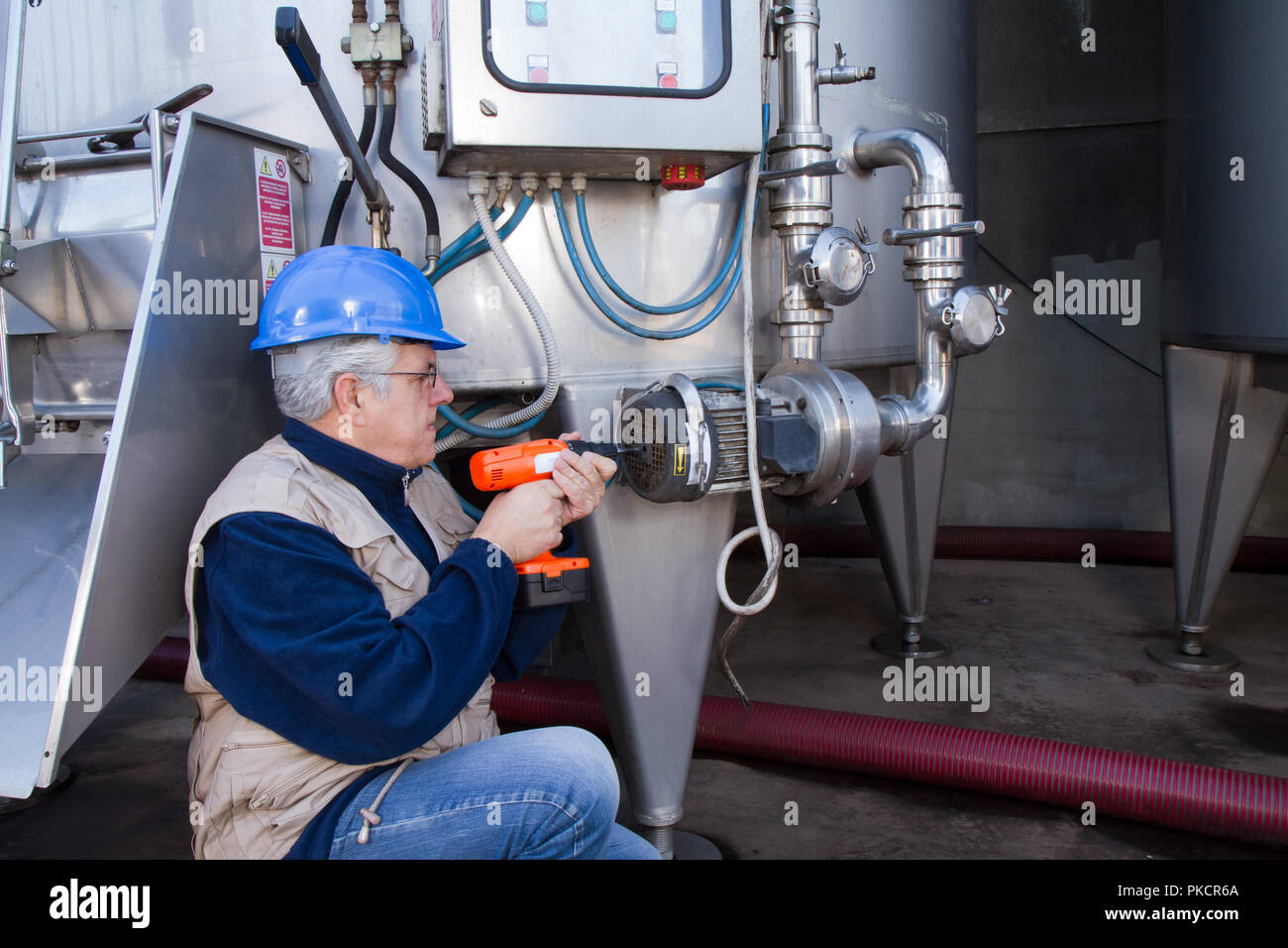 repairman during maintenance work Stock Photo - Alamy