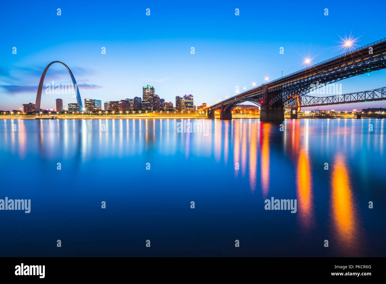 st. louis skyscraper at night with reflection in river,st. louis ...