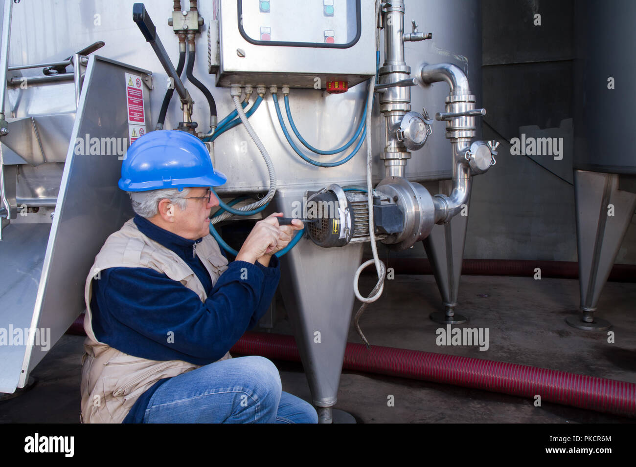 repairman during maintenance work Stock Photo - Alamy