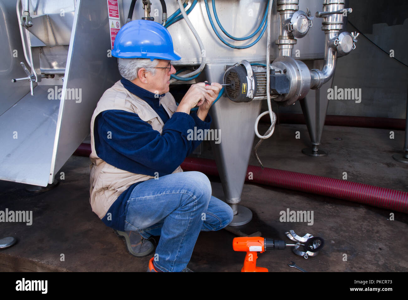 repairman during maintenance work Stock Photo - Alamy