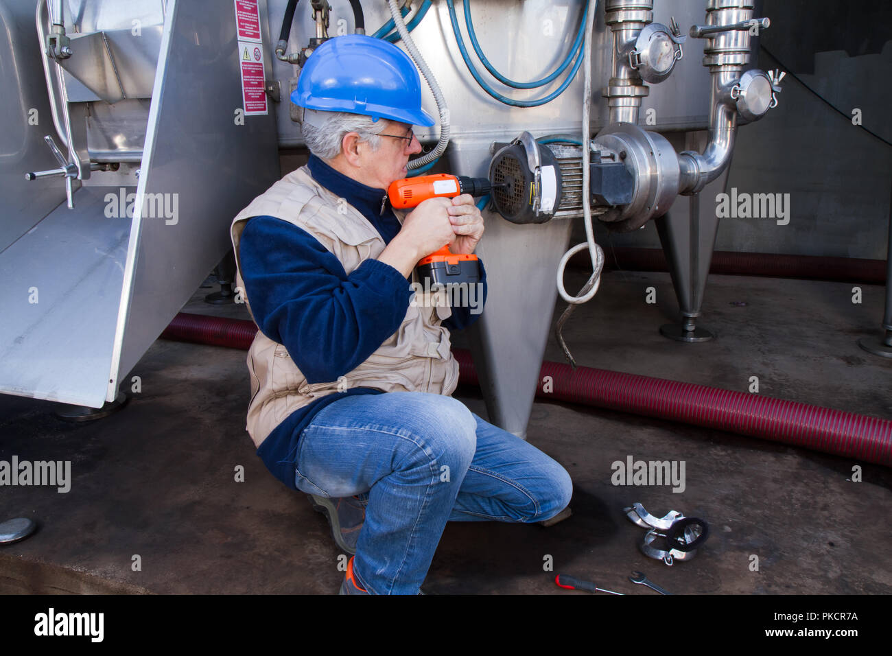 repairman during maintenance work Stock Photo - Alamy