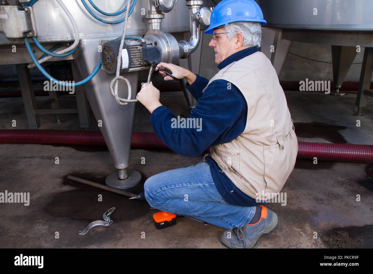 repairman during maintenance work Stock Photo - Alamy