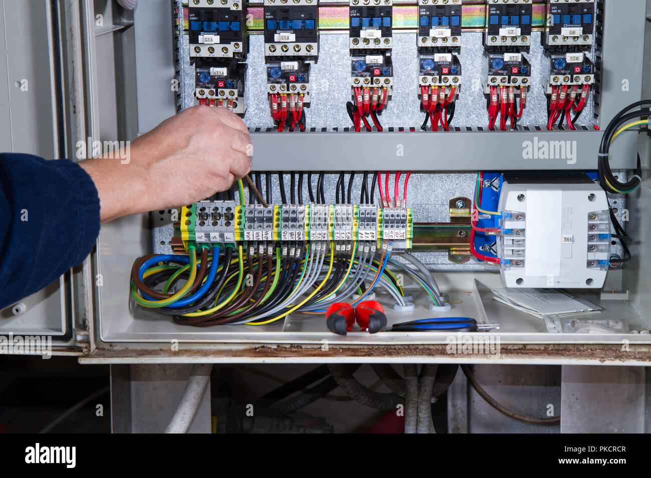 Electrician testing electrical panel hi-res stock photography and ...