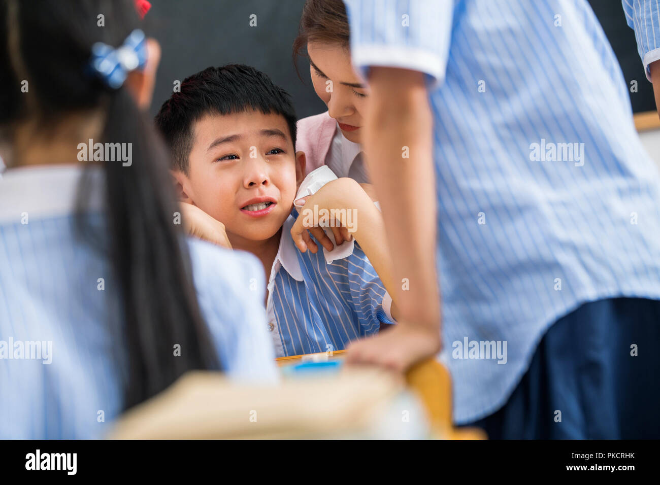 Classroom crying hi-res stock photography and images - Alamy