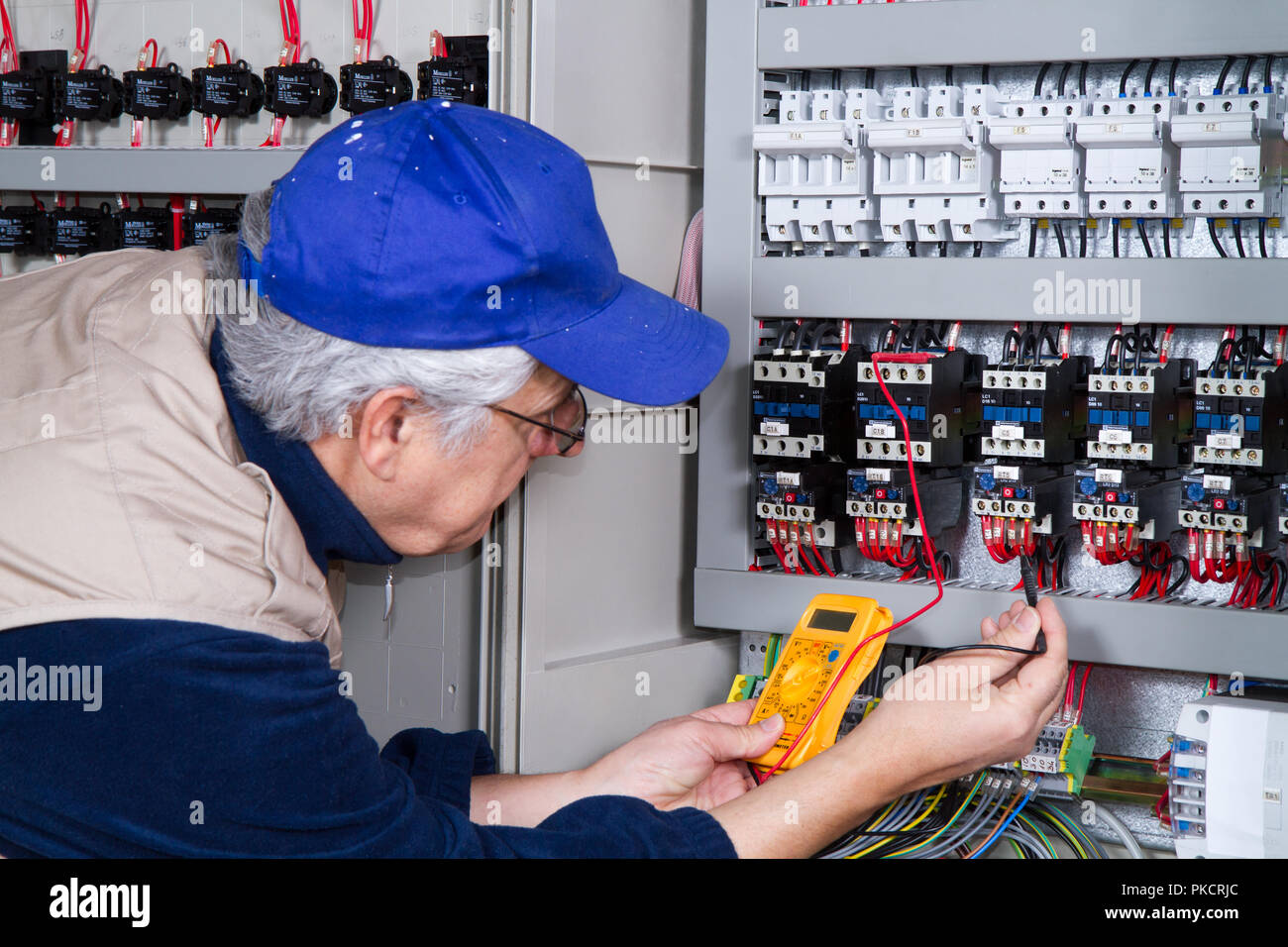 Electrician installing electric meter hi-res stock photography and ...