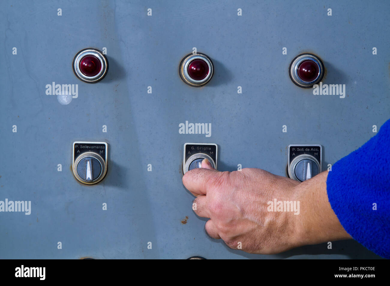 electrician at work with an electric panel Stock Photo - Alamy