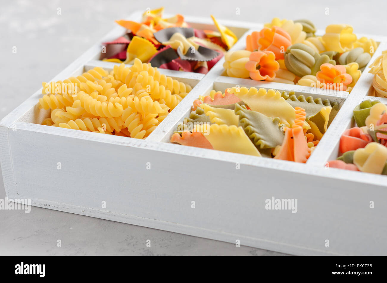 Variety of types and shapes of raw Italian pasta Stock Photo - Alamy