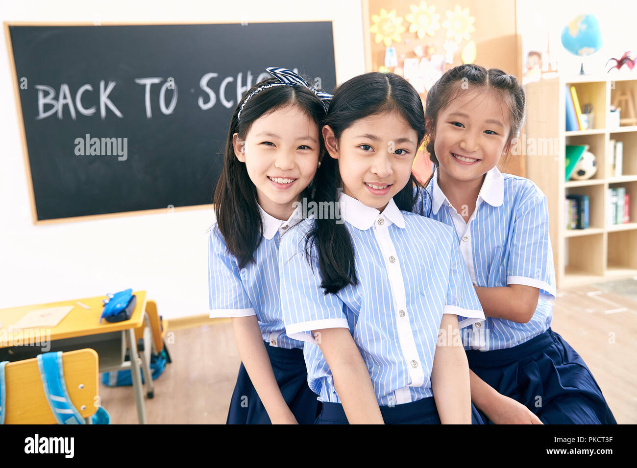 Cute little girls in the classroom Stock Photo - Alamy