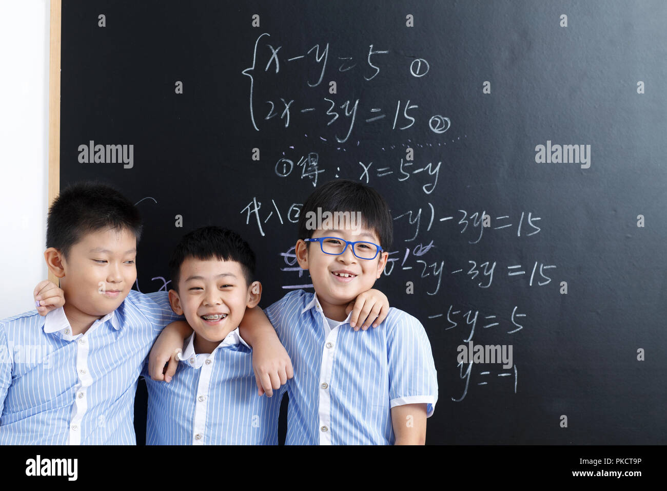 Cute little girls in the classroom Stock Photo - Alamy