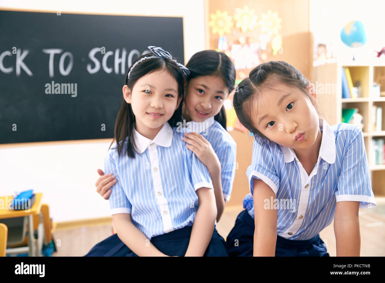 Cute little girls in the classroom Stock Photo - Alamy