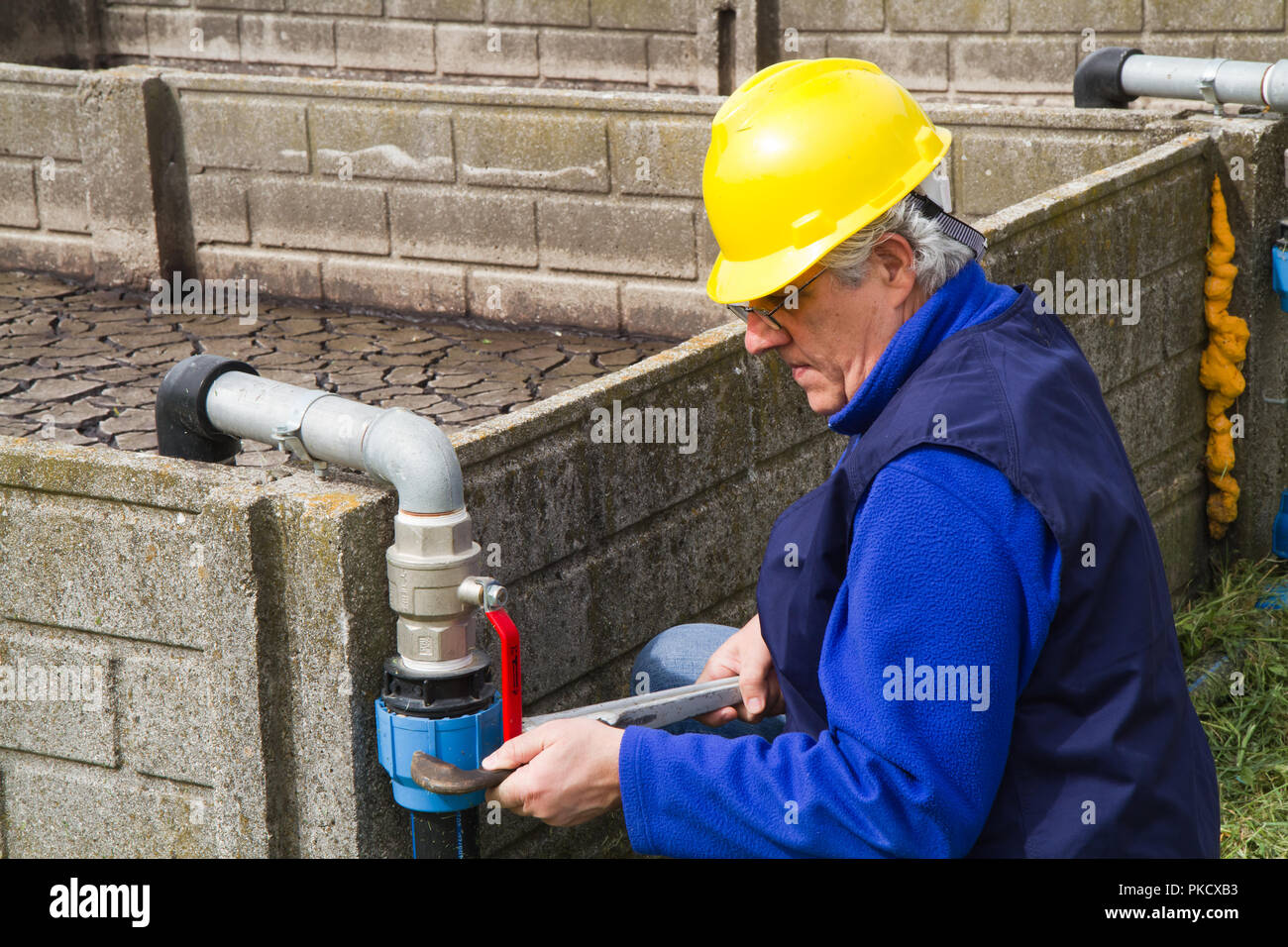 Worker installing wastewater plumbing hi-res stock photography and ...
