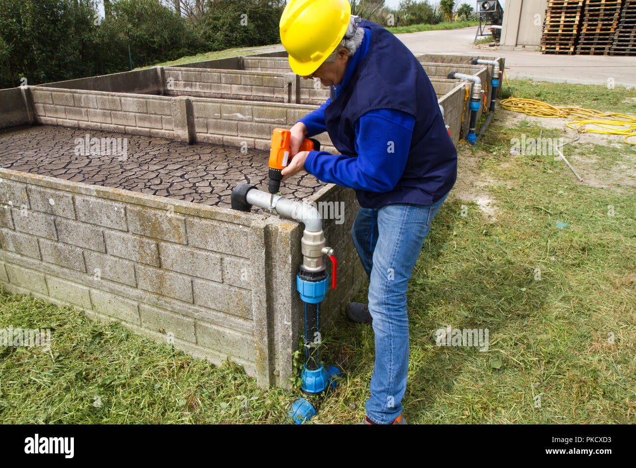 Worker installing wastewater plumbing hi-res stock photography and ...