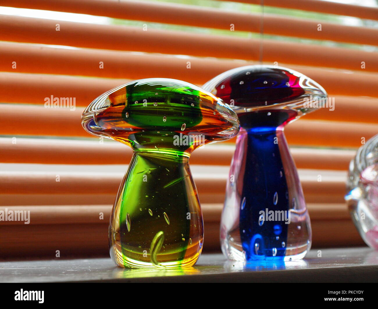 multi coloured glass mushrooms Stock Photo - Alamy