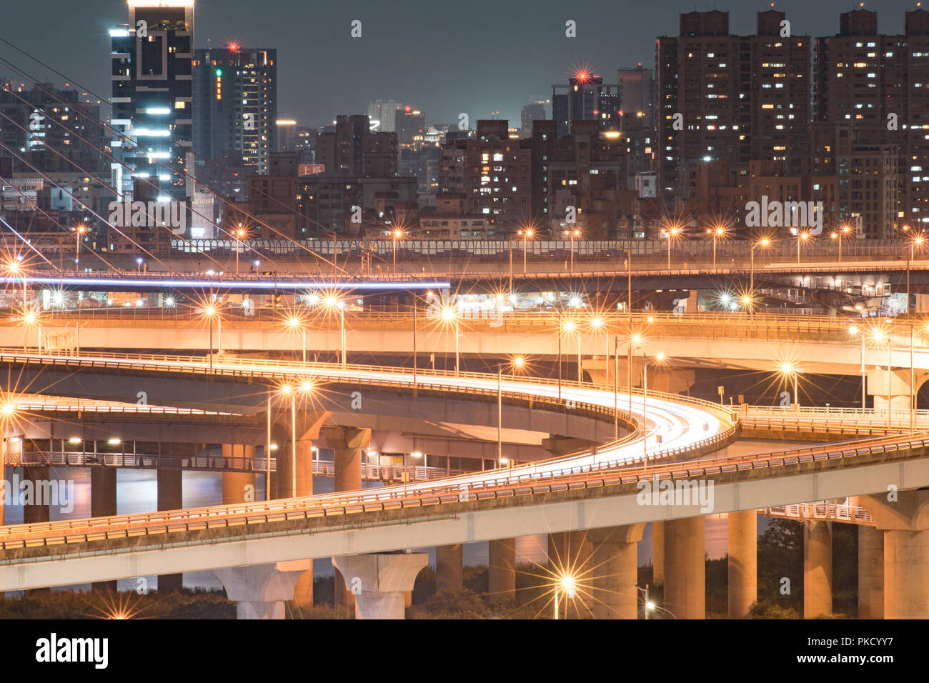 Car Light Trails of New Taipei Bridge - Busy Taipei bridge after ...
