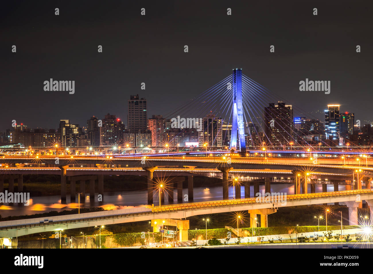Car Light Trails of New Taipei Bridge - Busy Taipei bridge after ...