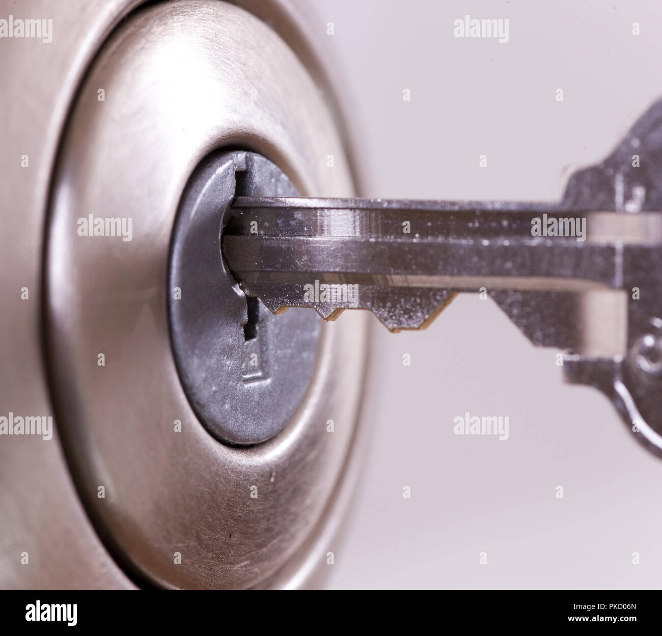 key and lock in the door close up Stock Photo - Alamy