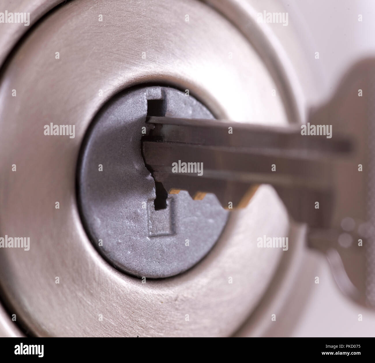 key and lock in the door close up Stock Photo - Alamy