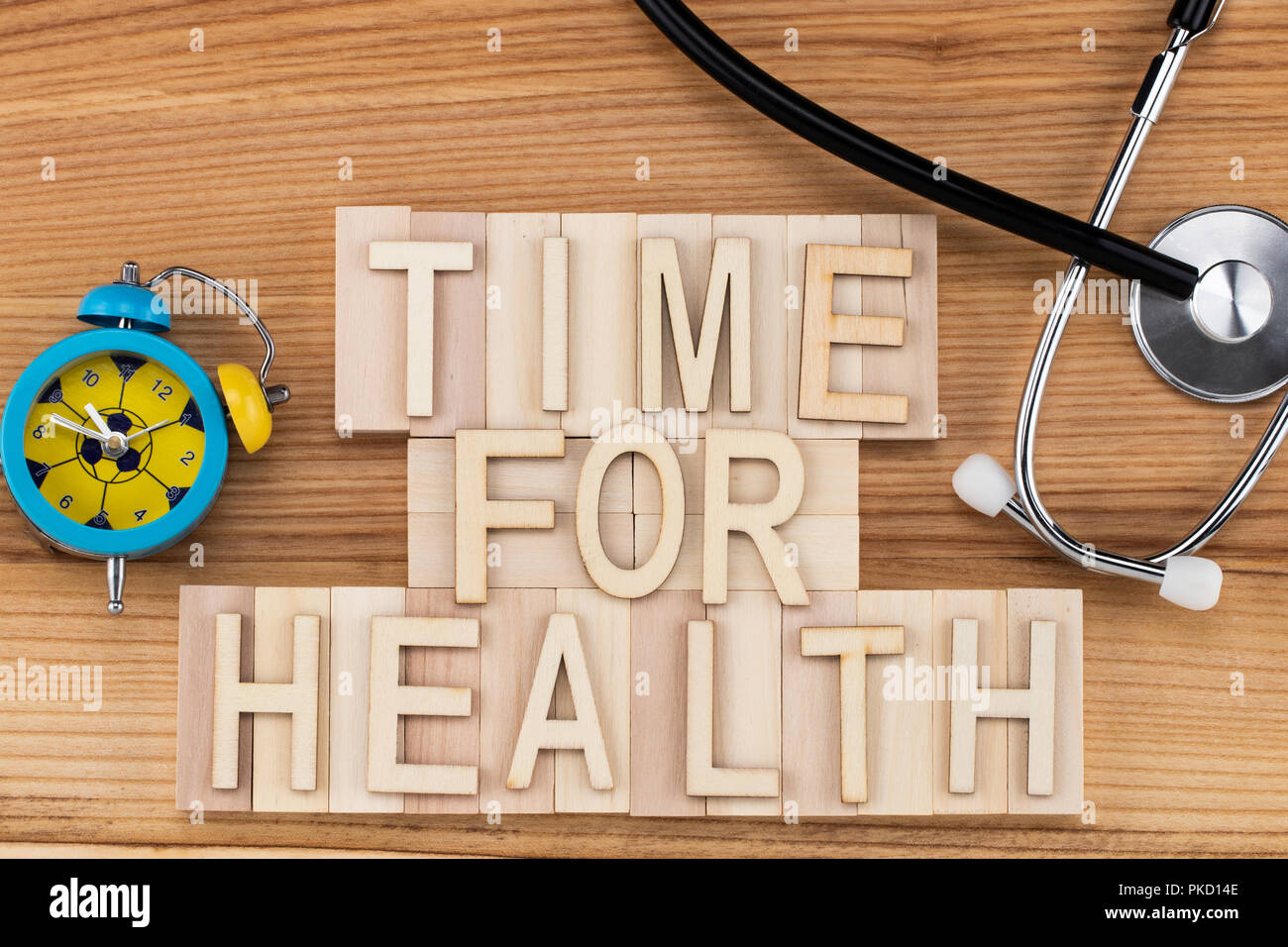 time for health - text in vintage letters on wooden blocks with ...