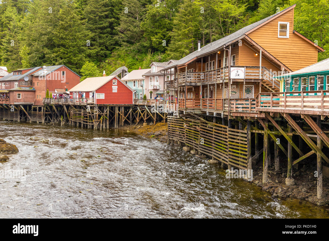 Some of the old timber houses in Creek Street built on stilts above the ...