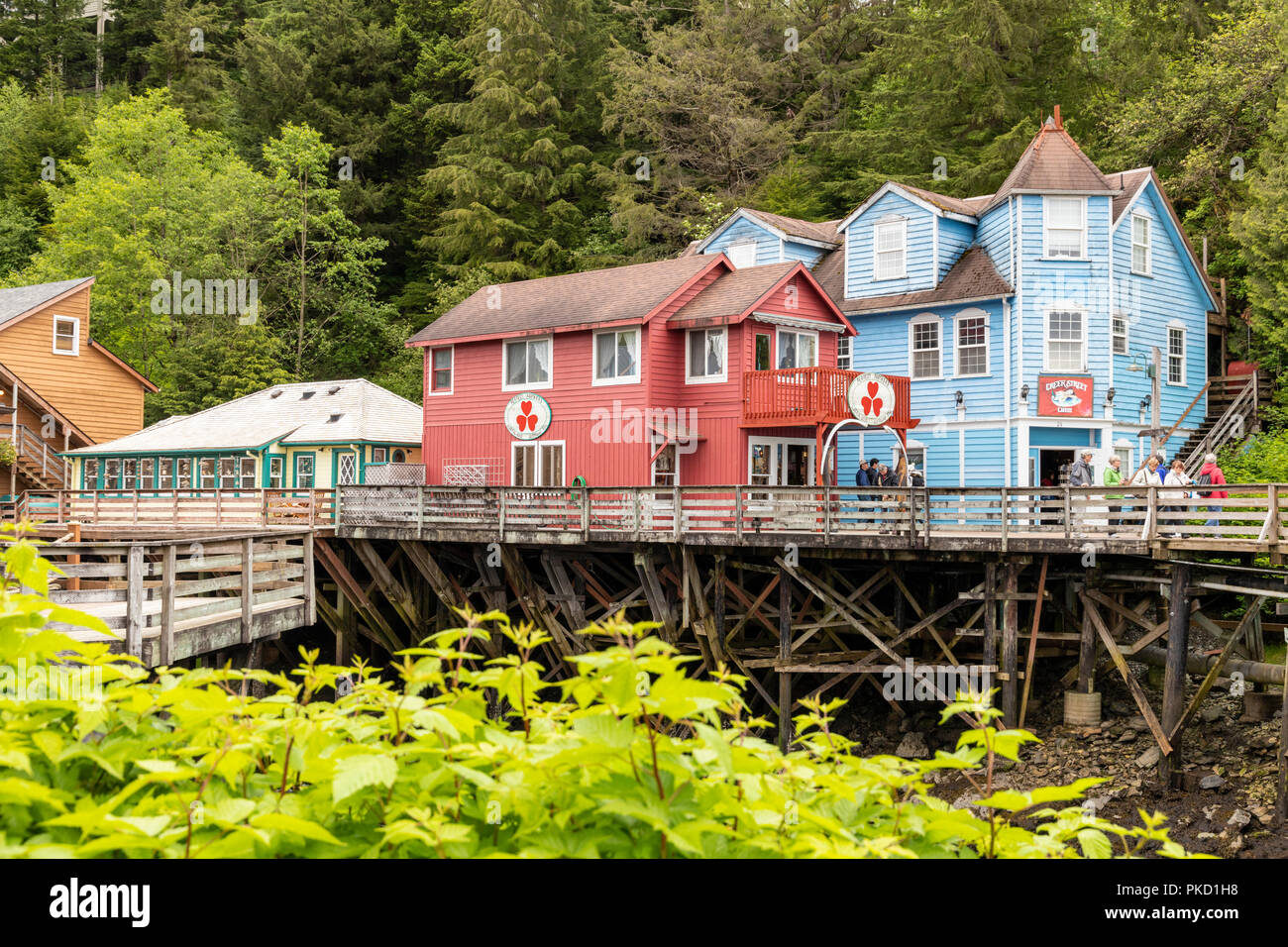 Some of the old timber houses in Creek Street built on stilts above the ...