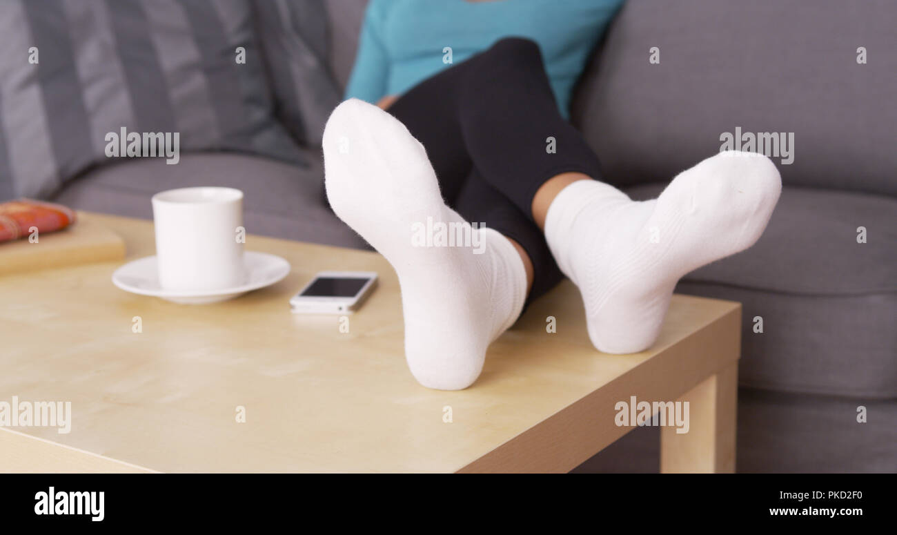Feet socks relaxing table hi-res stock photography and images - Alamy