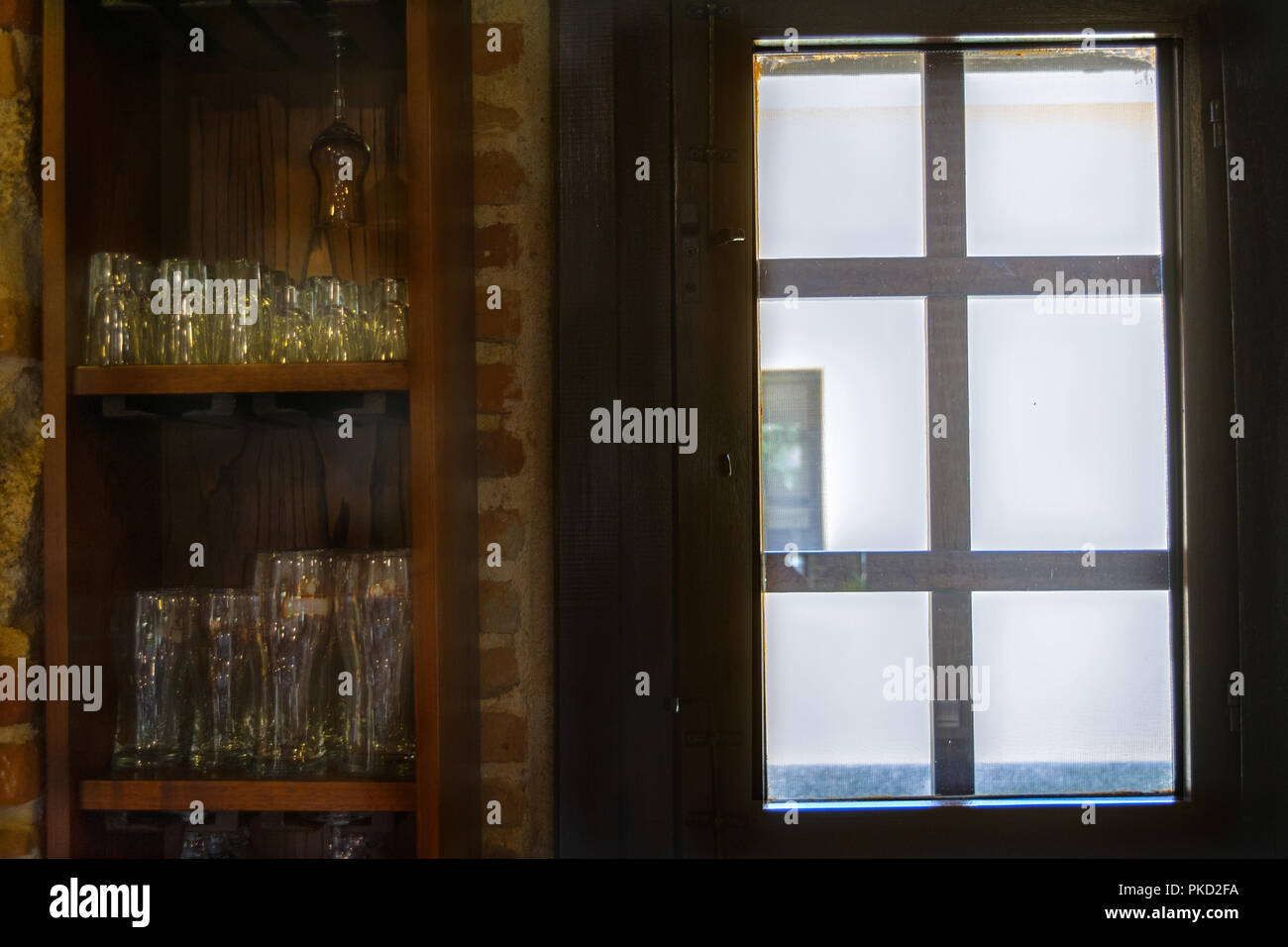 window of a pub photographed taken against the light Stock Photo - Alamy