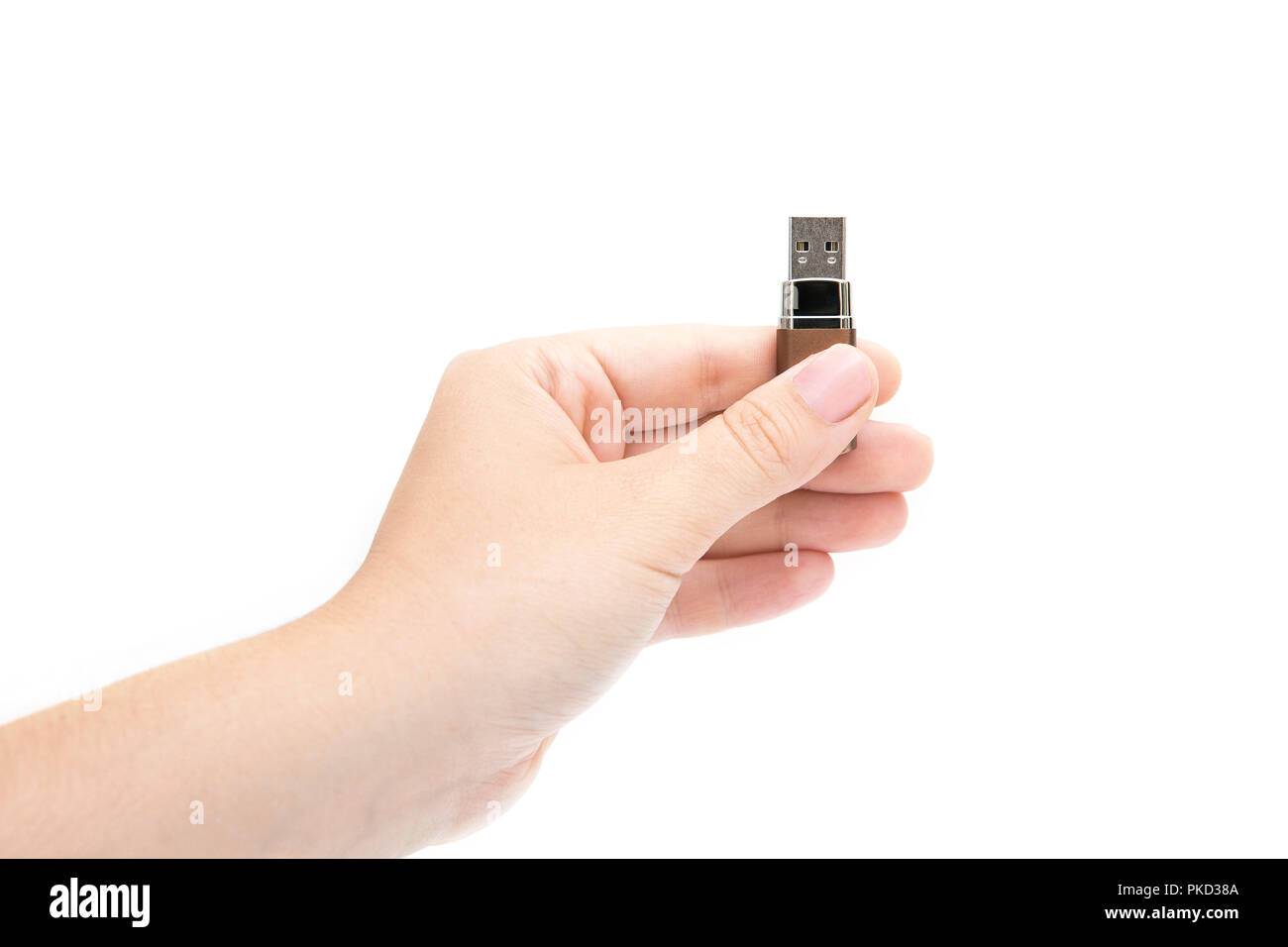 flash drive in woman's hand on white background. Female's hand holding ...