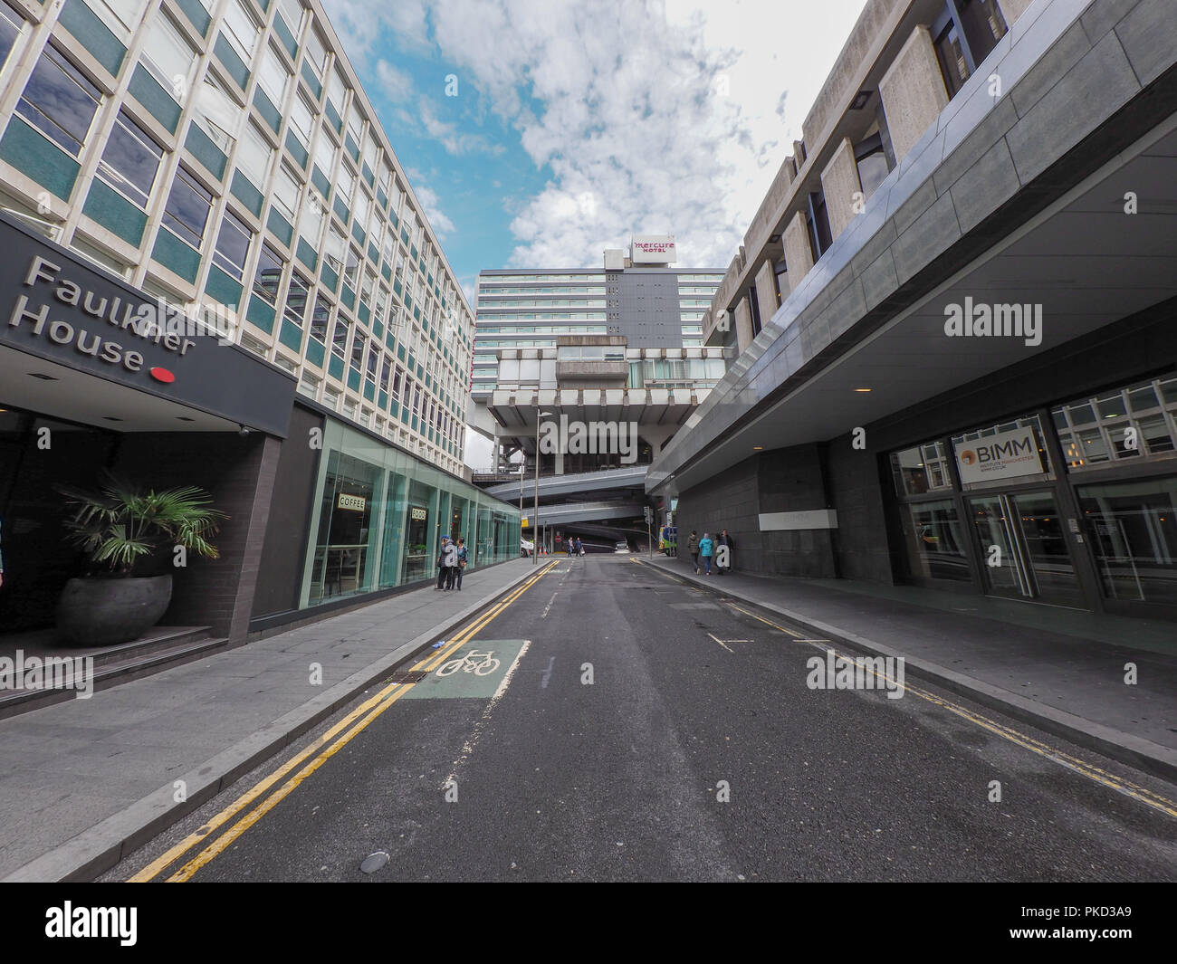 A street scene in Manchester City centre Stock Photo - Alamy