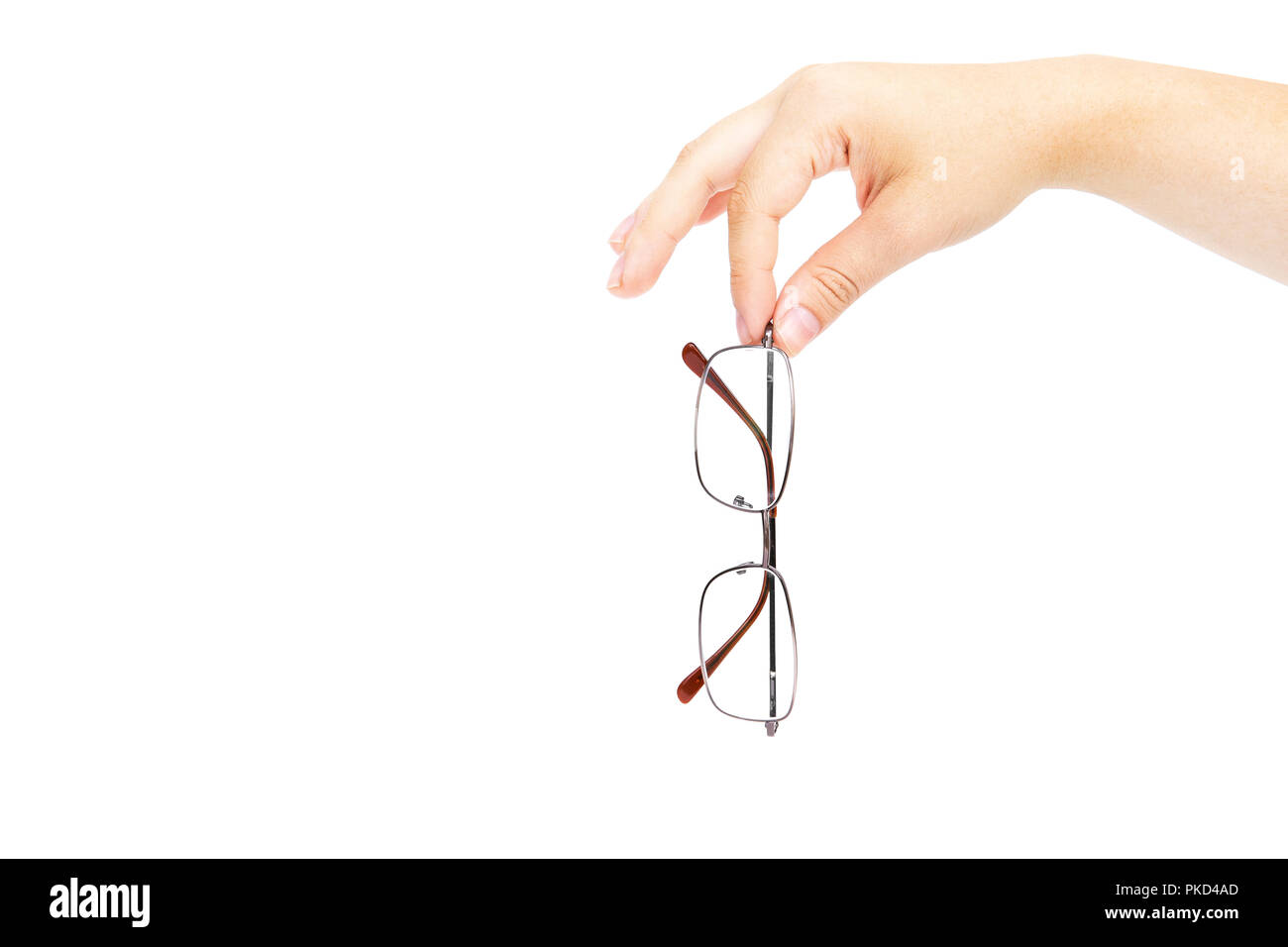 Female's hand holding glasse on white background. Glasses in hand ...