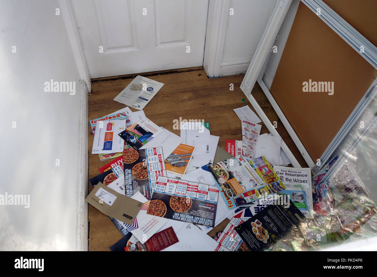 Junk Mail on the hall floor of a unloved and abandoned empty terraced ...