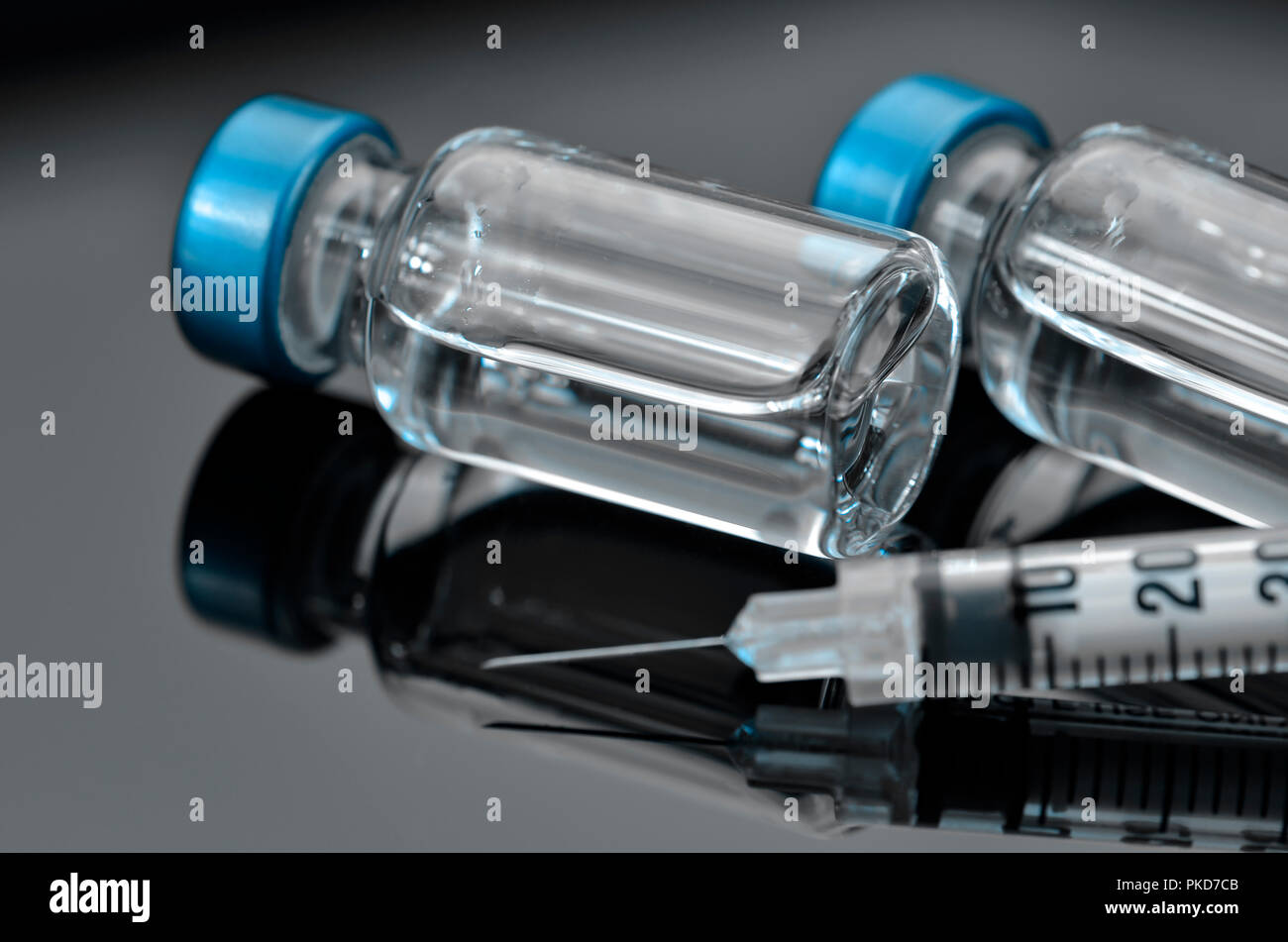 Tuberculin Syringe and Sterile Vial Filled with Medication Solution. An ...