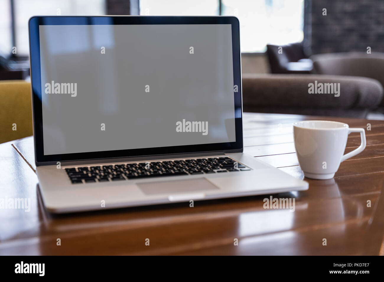 mock up Using laptop with blank screen computer modern Stock Photo - Alamy