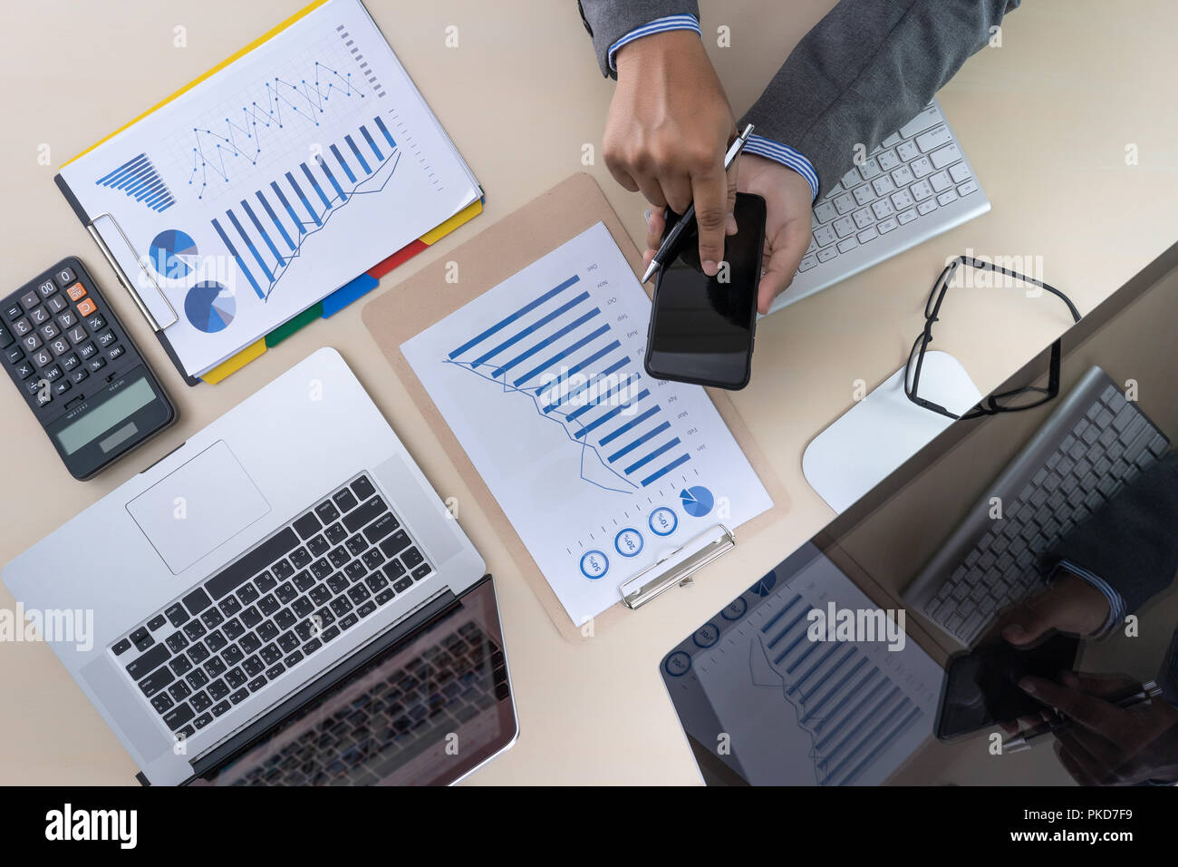 analyzing the work Accounting on Laptop investment concept Stock Photo ...