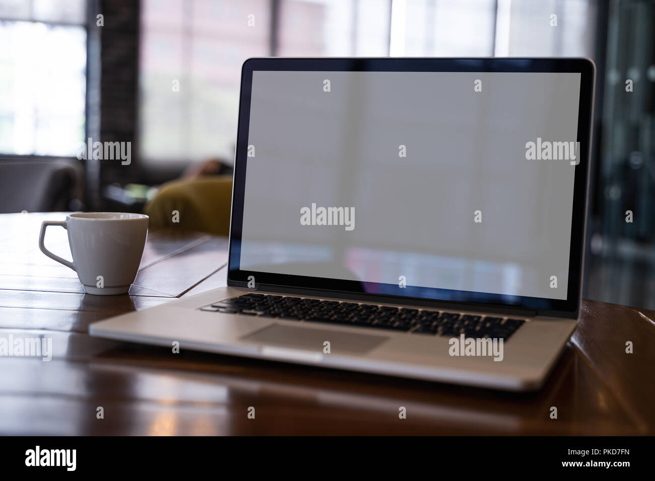 mock up Using laptop with blank screen computer modern Stock Photo - Alamy